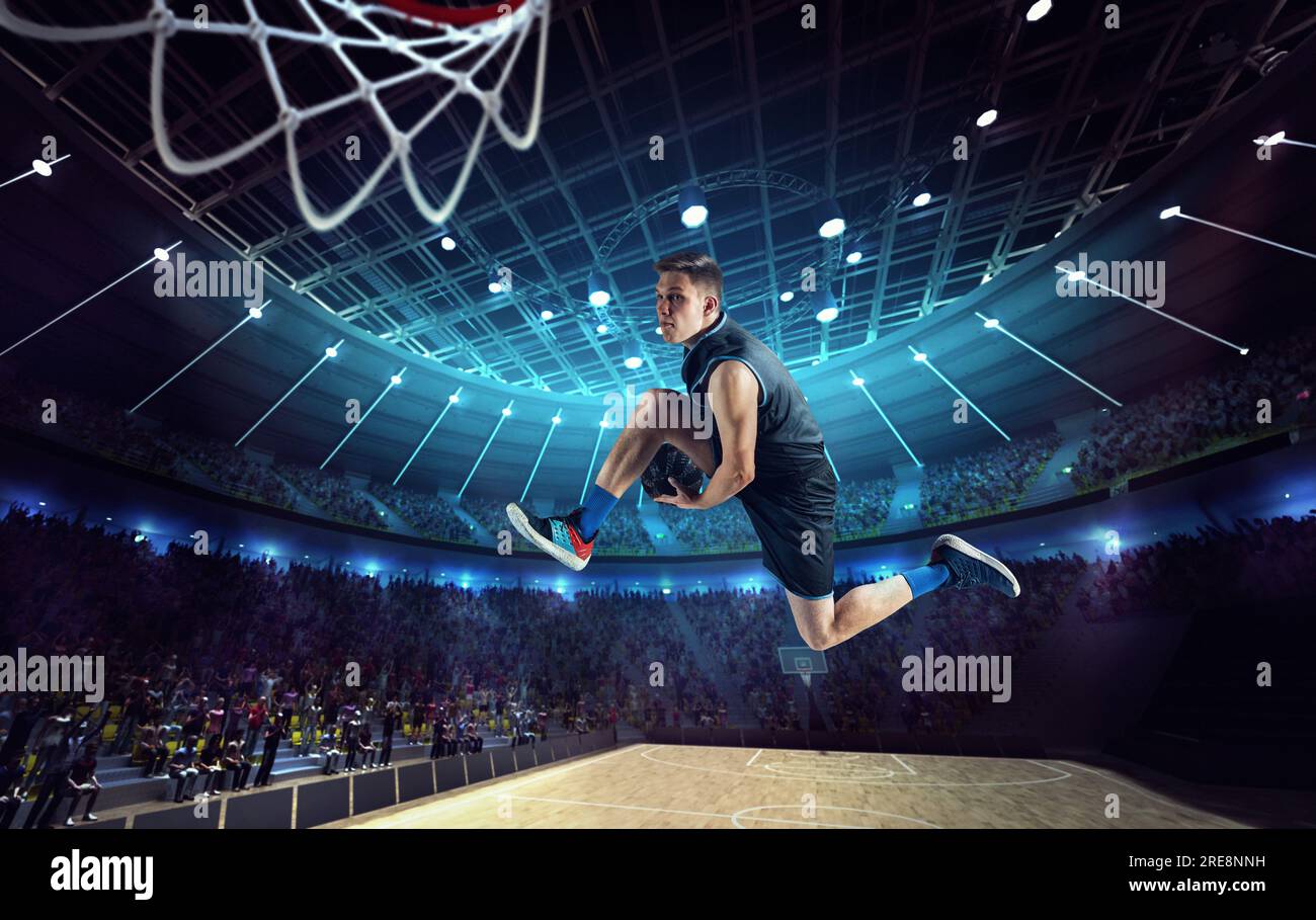 Slam dunk. Young man, professional basketball player on 3D stadium ...