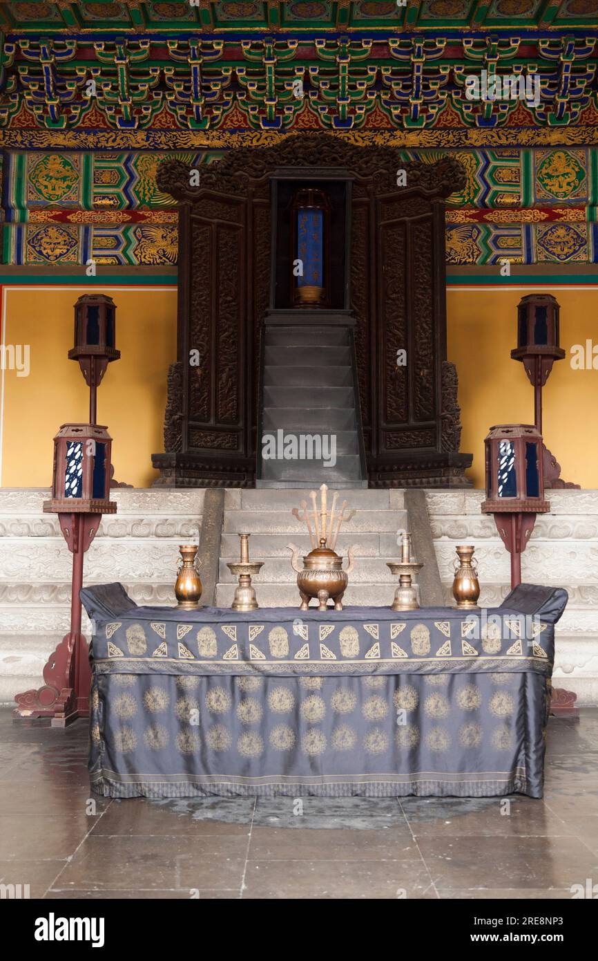 Shrine and altar with steps / stairs leading to cupboard containing ...
