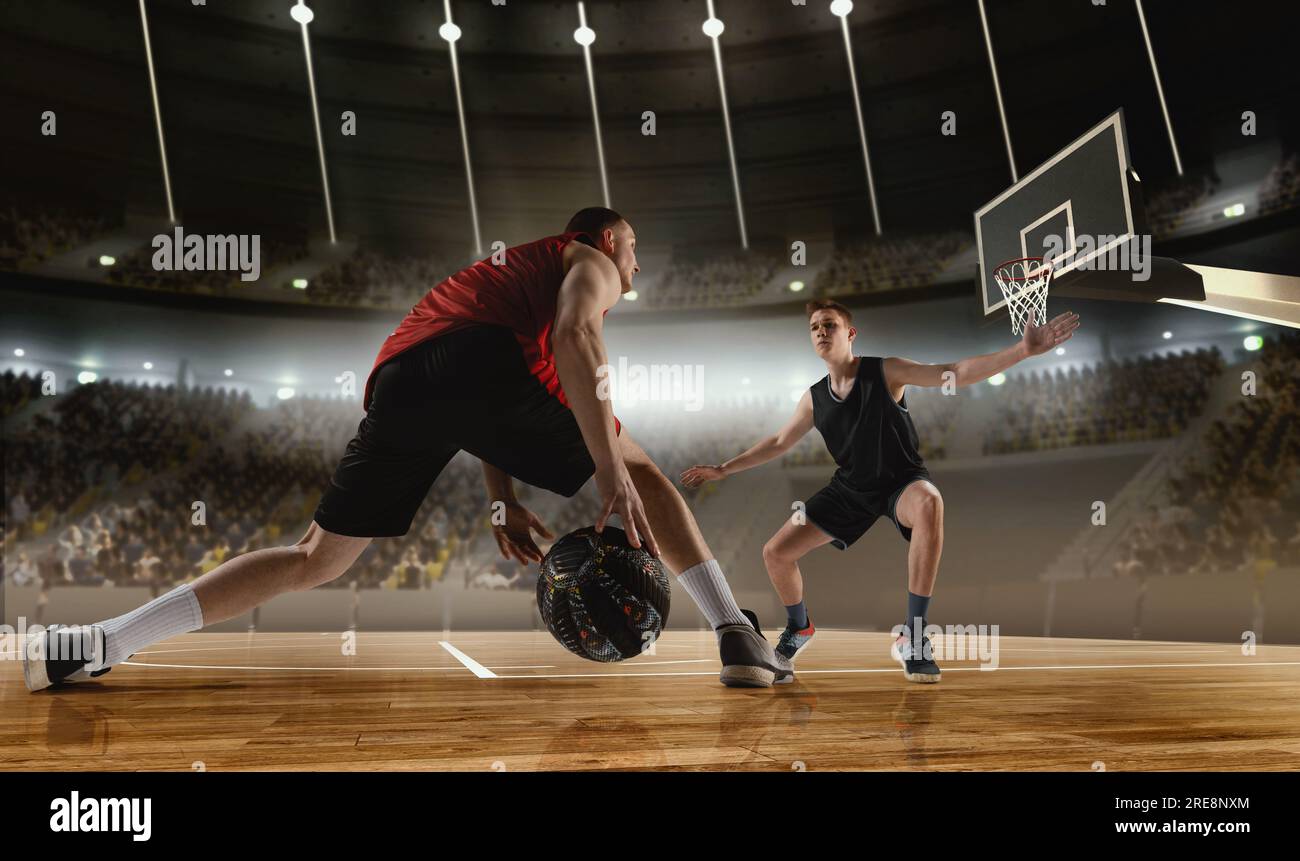Competitive young men, basketball players in motion during match, game ...