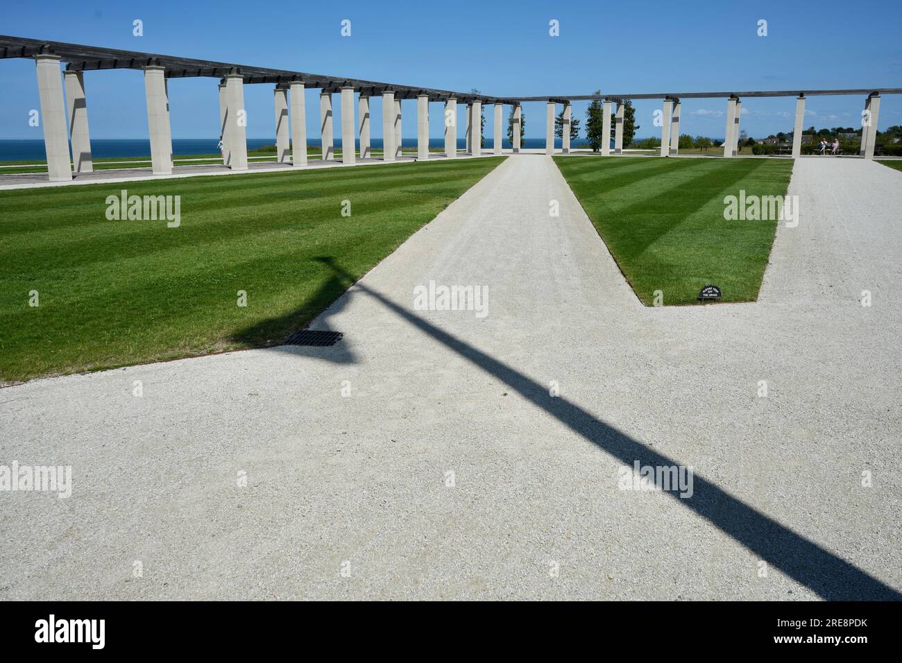 Stone Walkways at The British Normandy Memorial, with blue skies above ...