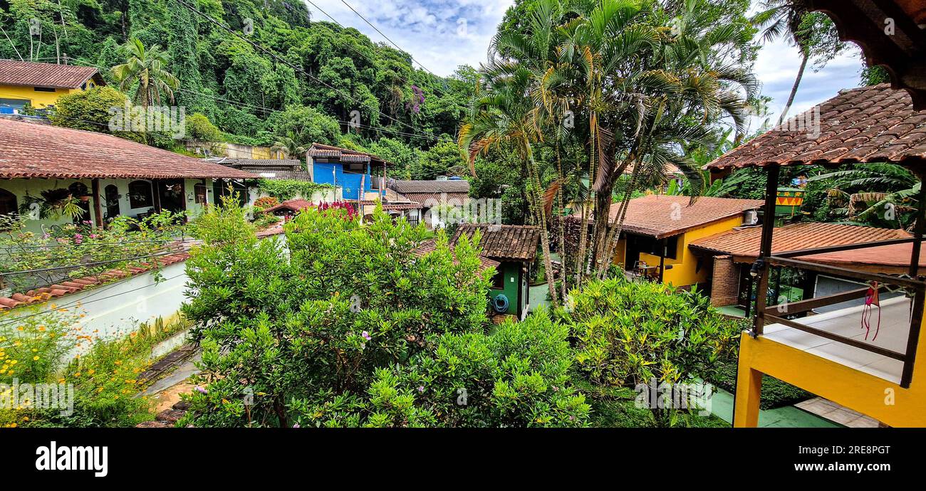 Vila do Abraao town at Ilha Grande island with beautiful houses and ...