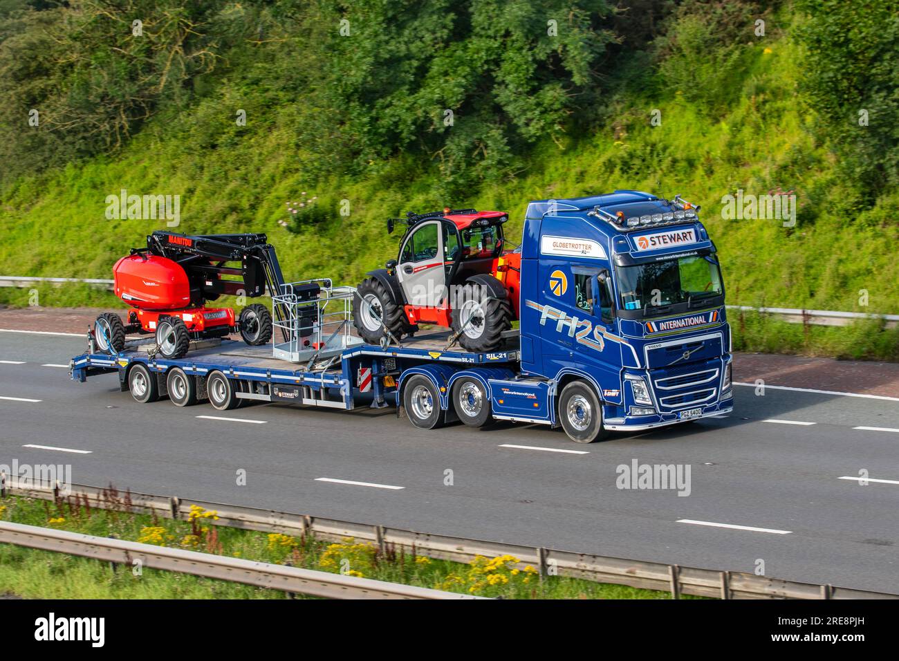 STEWART INTERNATIONAL TRANSPORT LTD truck carrying Manitou 160 ATJ ...