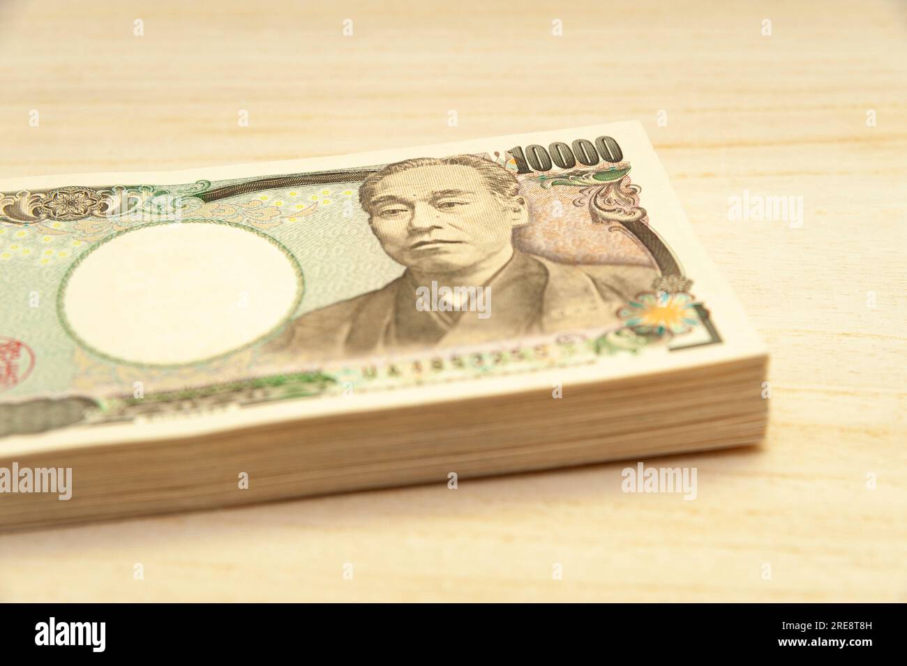 Ten thousand yen (10,000 yen) banknotes stacked. Japanese money. Paper ...