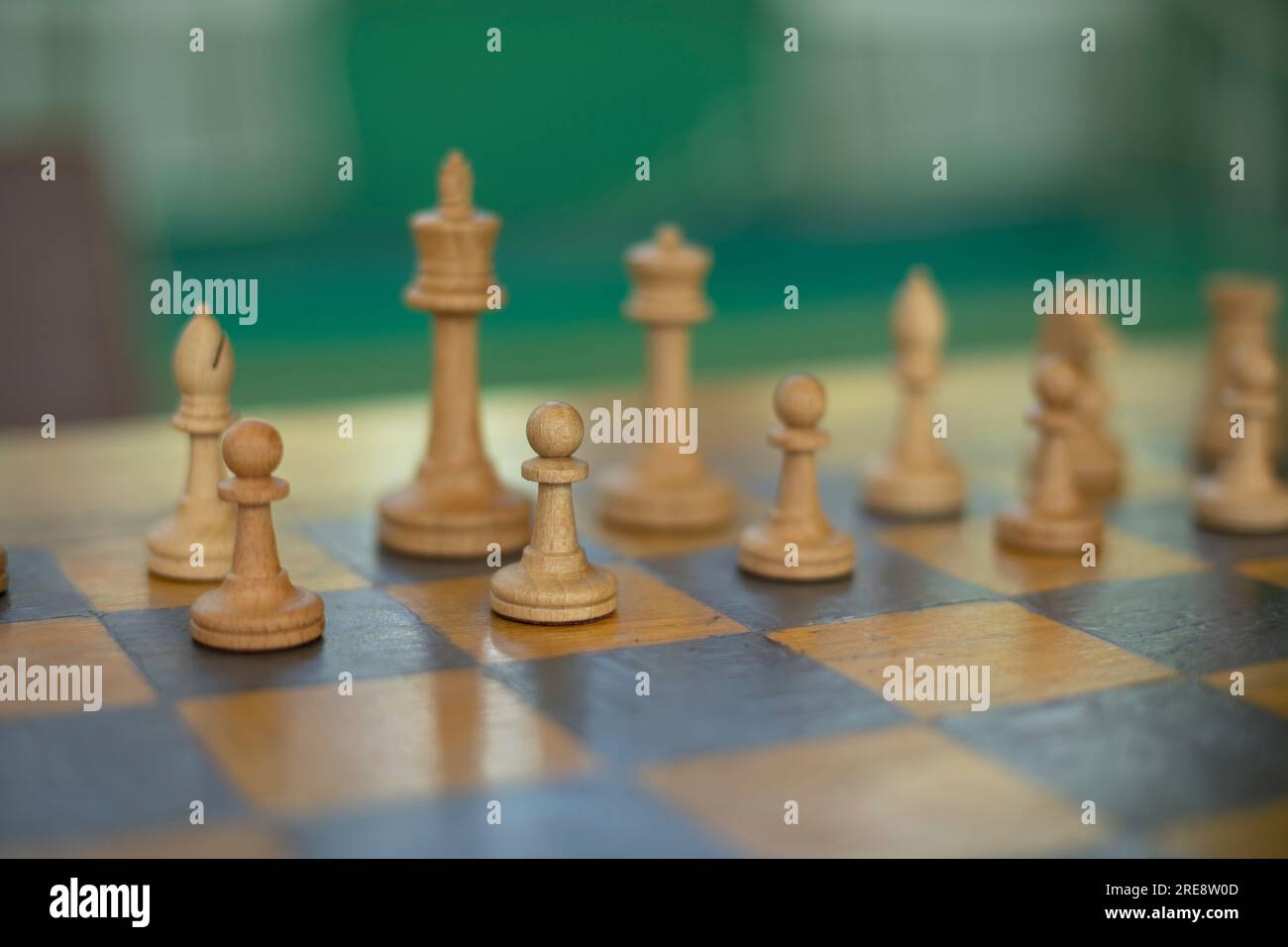 Chess pieces on table. Chess Tournament. Ancient Strategy. Game figures ...