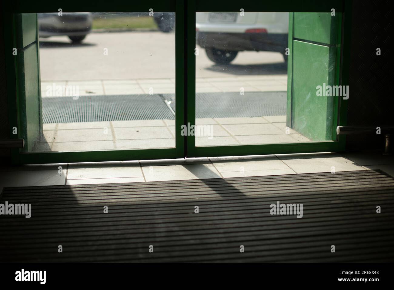 Sliding doors. Automatic doors in store. Glass entrance. Details of ...