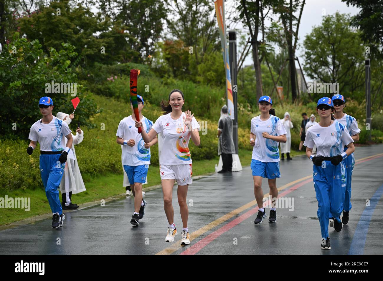 Chengdu, China's Sichuan Province. 26th July, 2023. Torch bearer Jiang ...