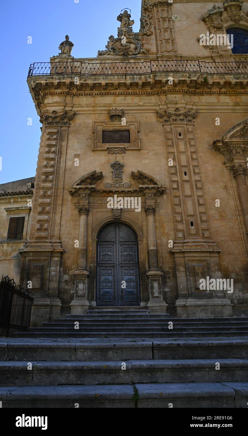 Scenic facade view of the Baroque Sicilian style Duomo di San Pietro a ...
