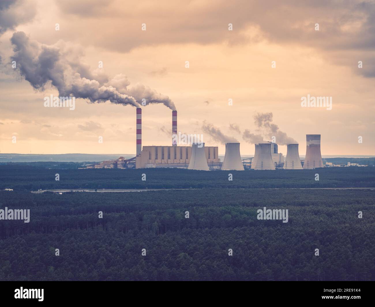 Aerial view of power plant, smoke from chimneys and open-cast coal mine ...