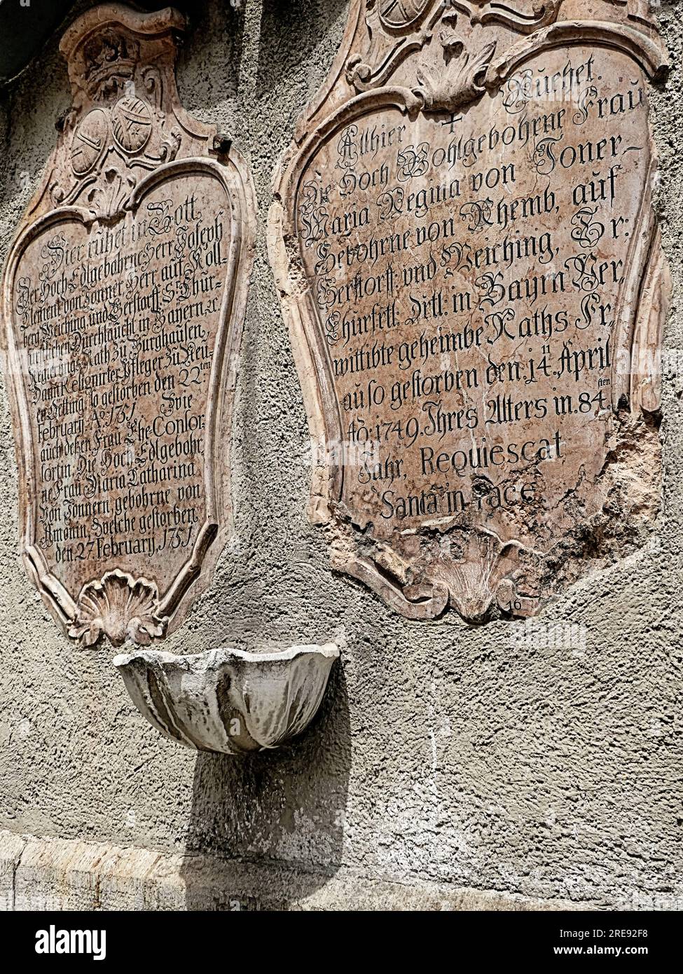 Two antique marble tombstones of the 18th century with inscription in ...