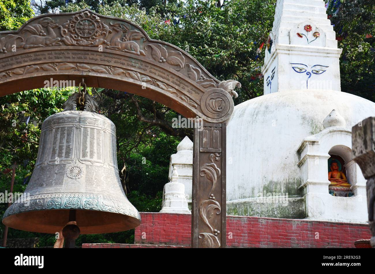 Iron metal big bell at stupa chedi Swayambhunath pagoda or Swayambu or ...