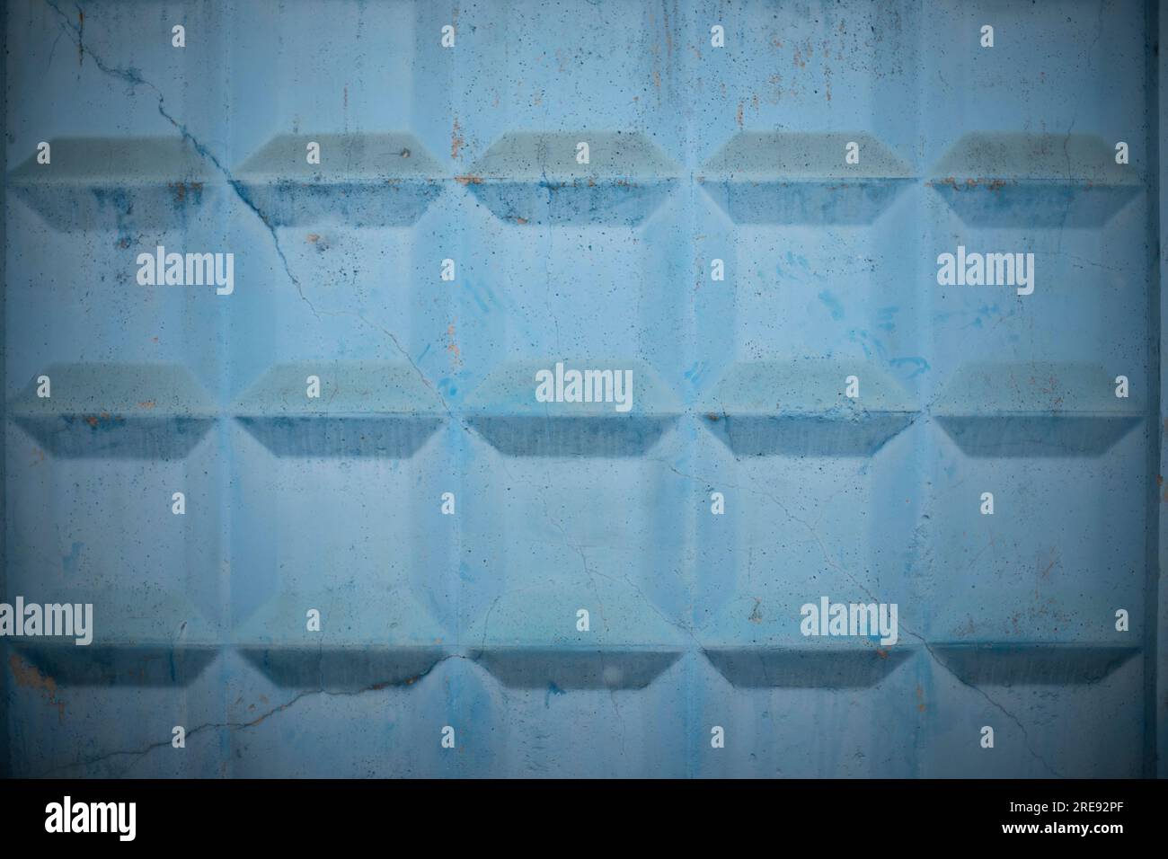 Checkered wall. Concrete fence. Blue background. Three-dimensional ...