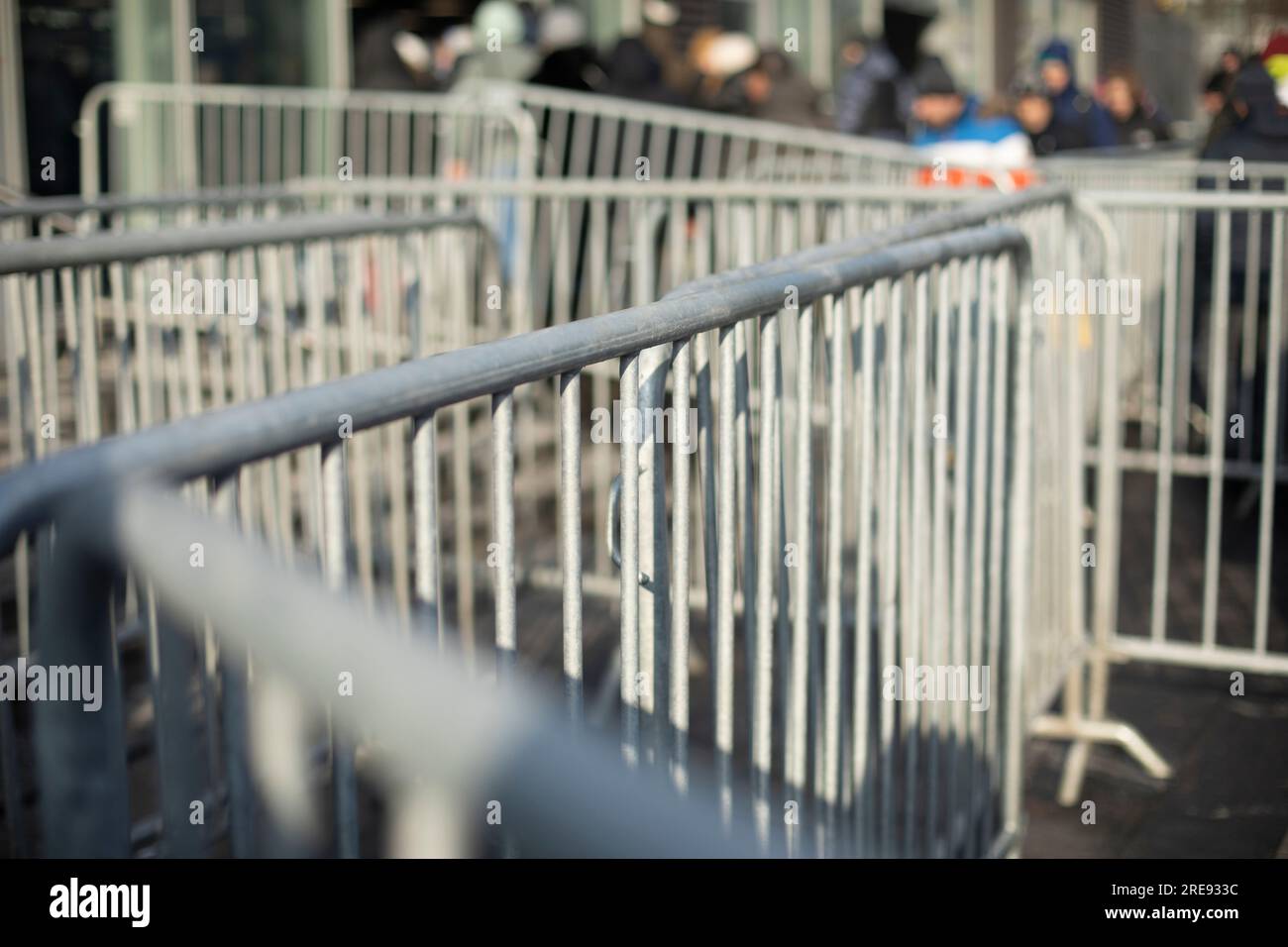 Fence at public event. Grey fence to block crowd. Steel frame. Details ...