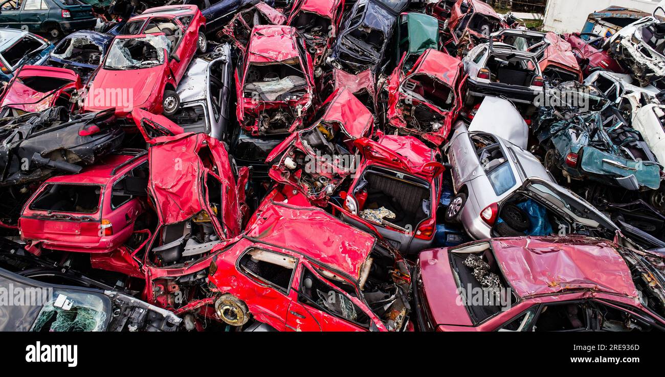 Damaged, broken and corroded cars in a scrapyard Stock Photo - Alamy