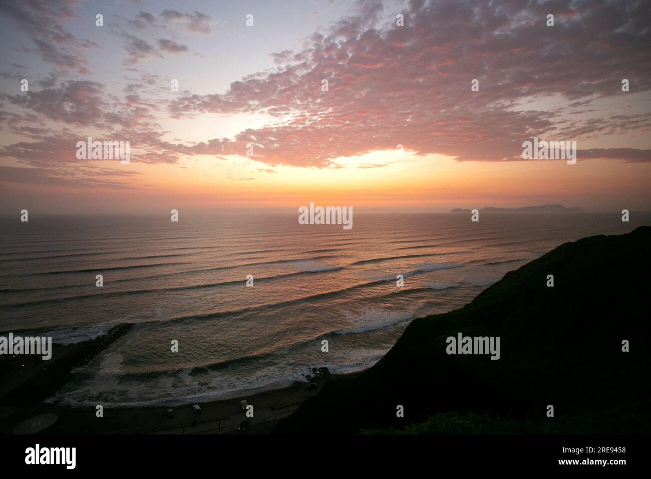 Sunset at sea seen from the Miraflores neighborhood in the city of Lima ...