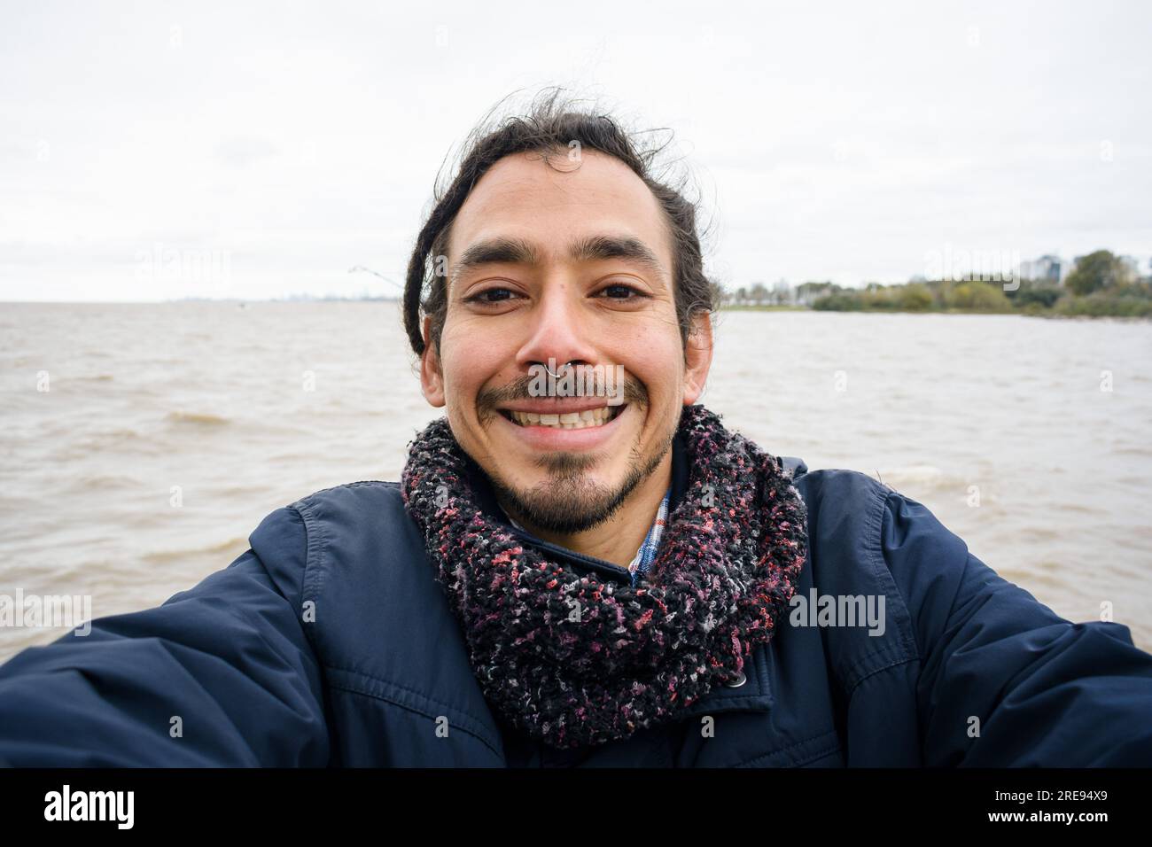 selfie portrait of young venezuelan man with mustache and beard, nose ...