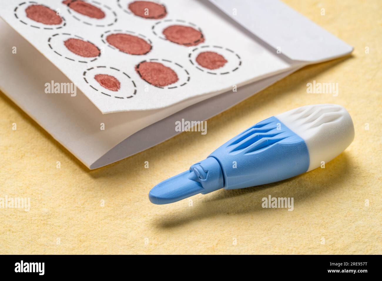 lancet and dry blood spots on a fiber filter for laboratory analysis ...