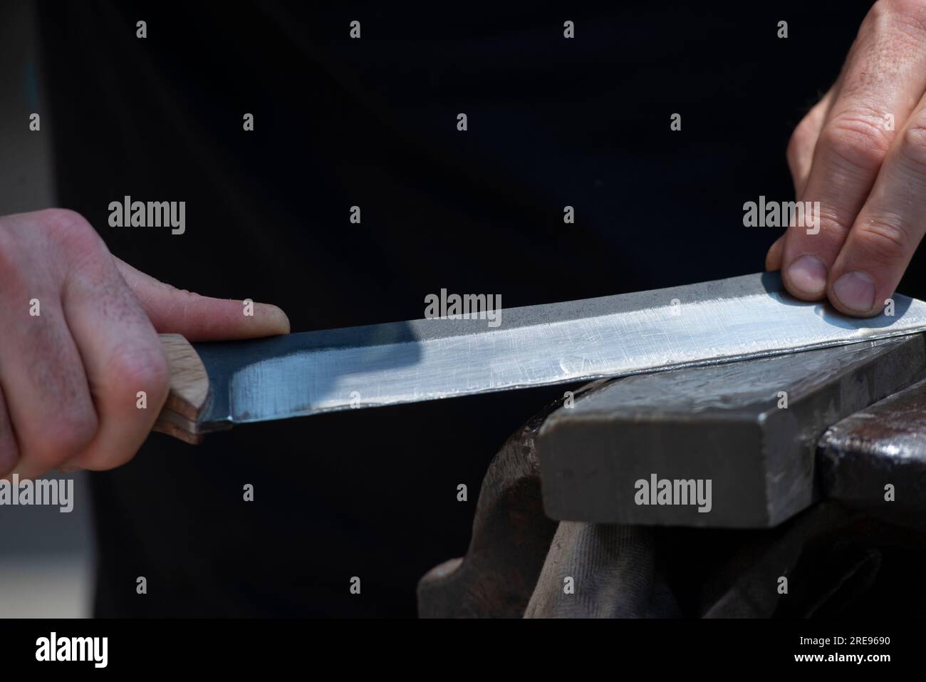 Axe sharpening hi-res stock photography and images - Alamy