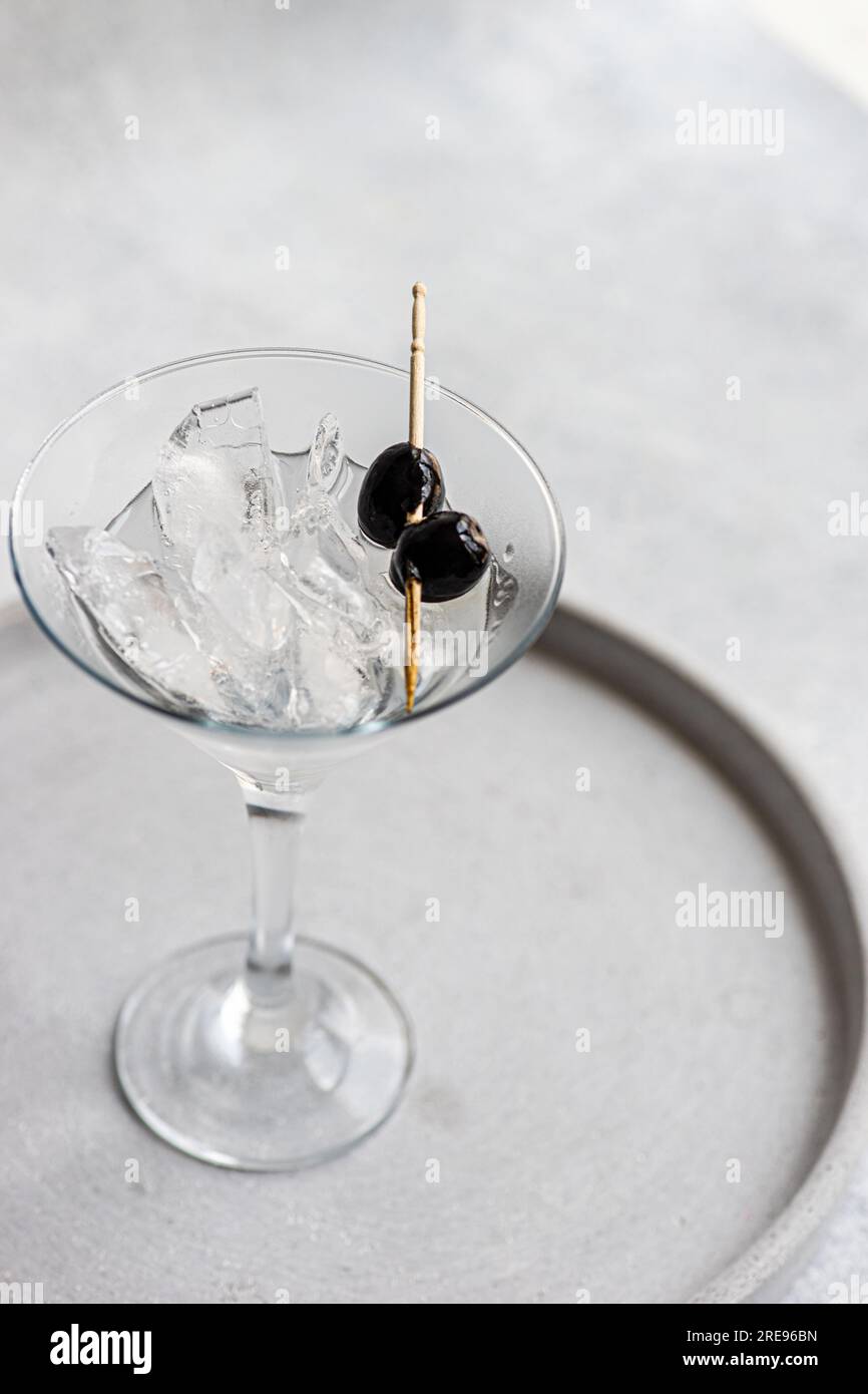 From above glass filled with alcohol martini vodka cocktail with black ...