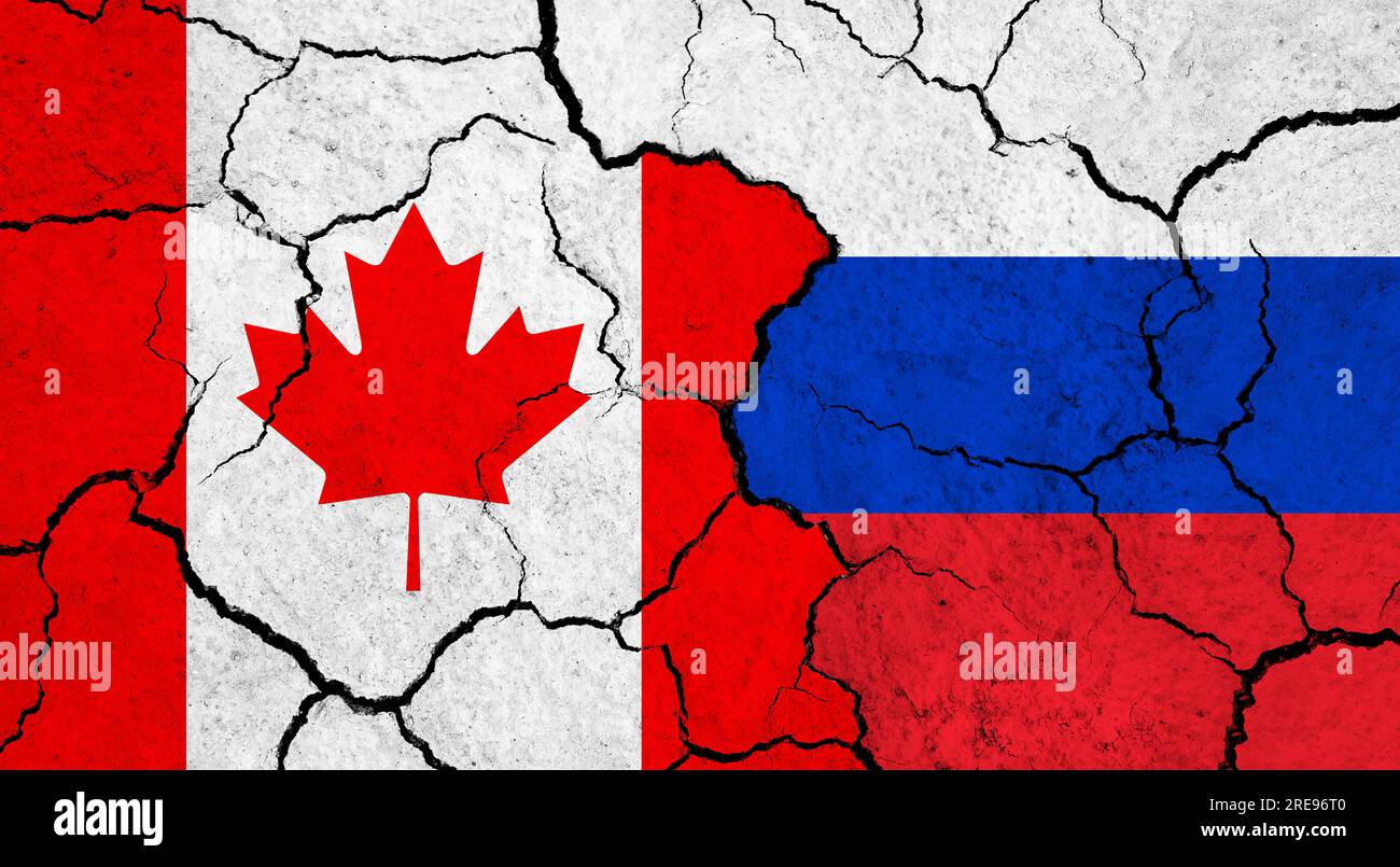 Flags of Canada and Russia on cracked surface - politics, relationship ...