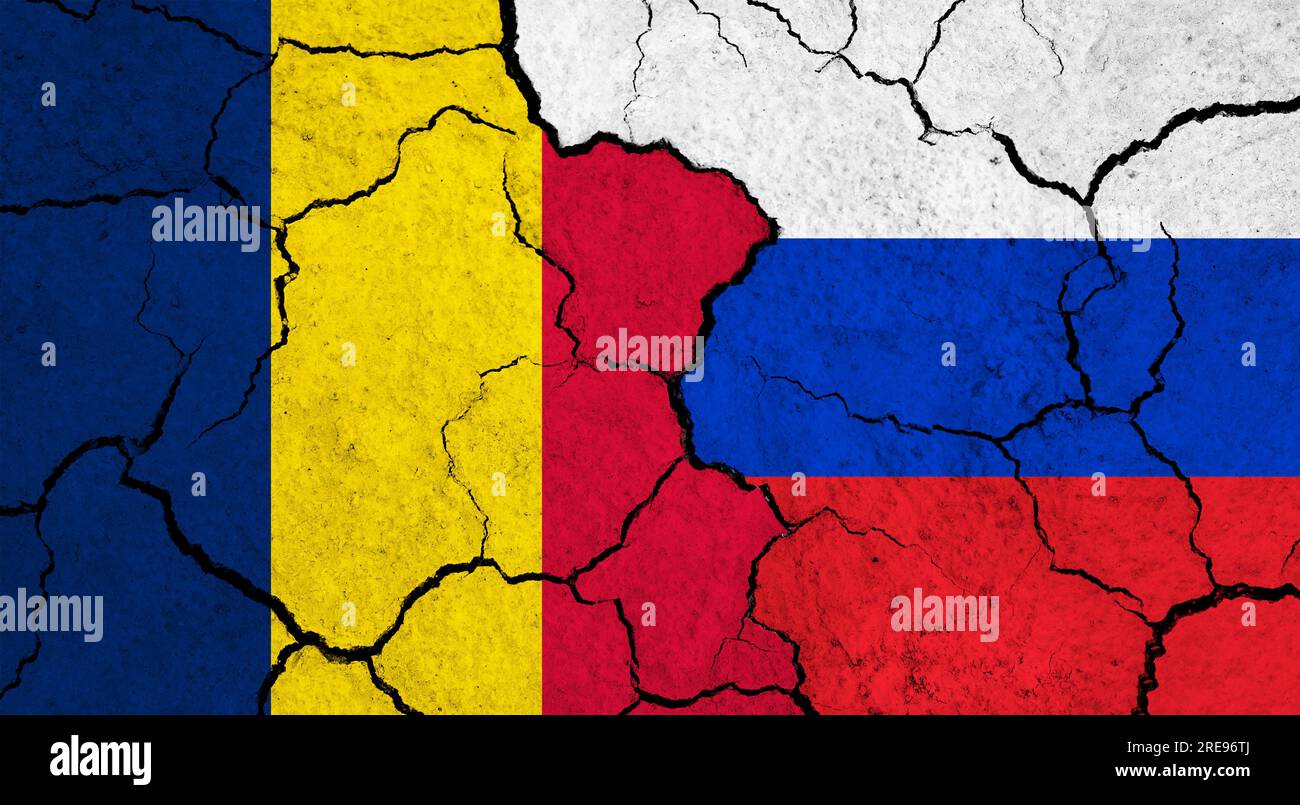 Flags of Chad and Russia on cracked surface - politics, relationship ...