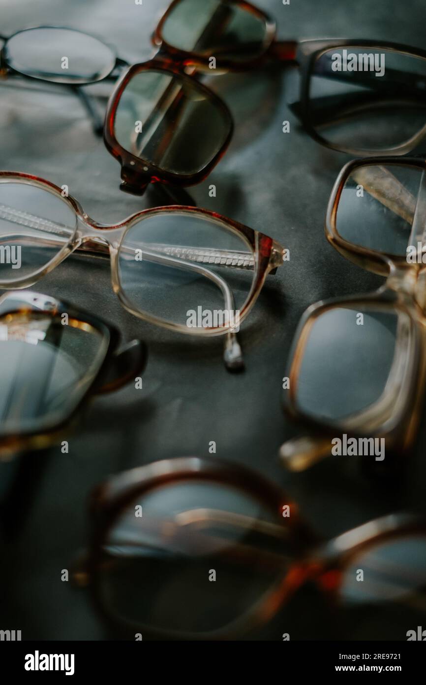 High angle of stylish eyeglasses with colorful rims spread out while ...