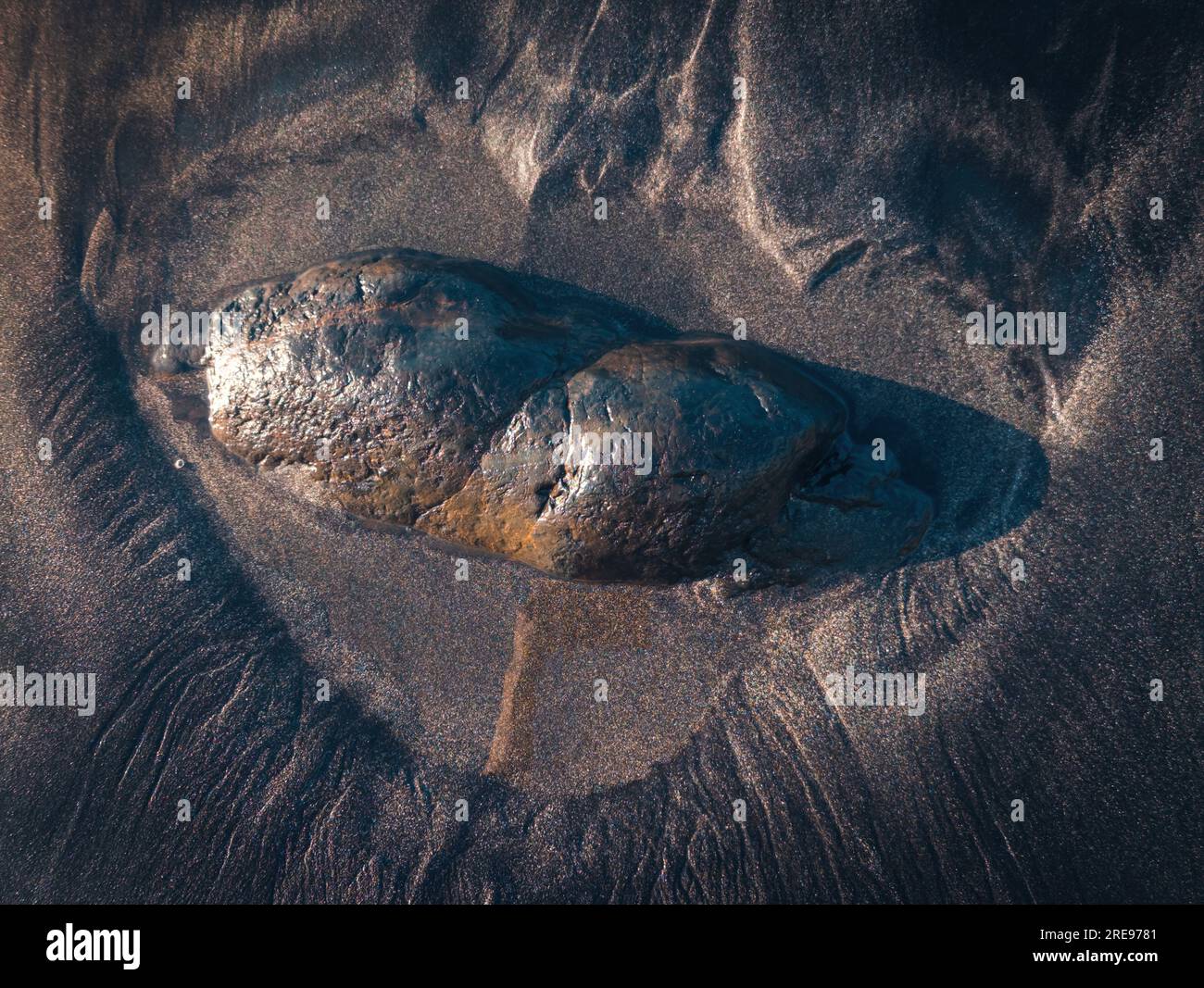 Top view of huge boulder of granite stone located on surface of ...