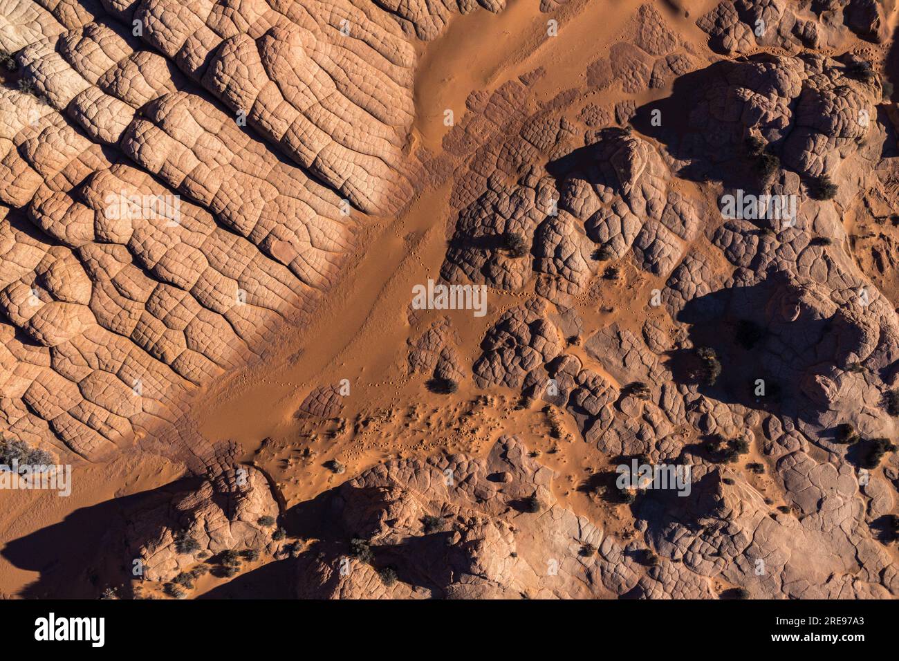 Breathtaking drone view of rough rocky formations and sandy ground on ...