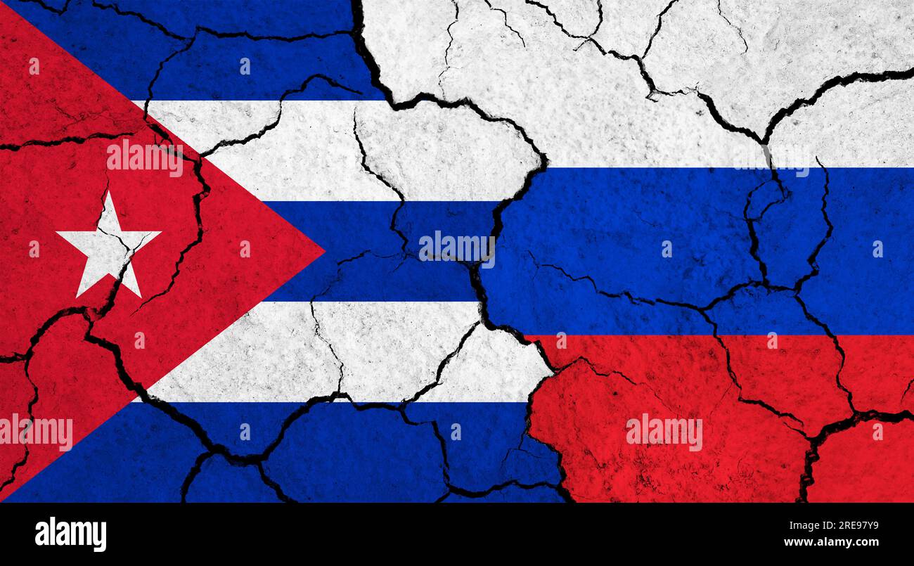 Flags of Cuba and Russia on cracked surface - politics, relationship ...