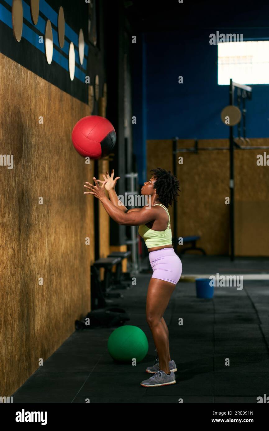 Woman fitness ball against the wall hi-res stock photography and images ...