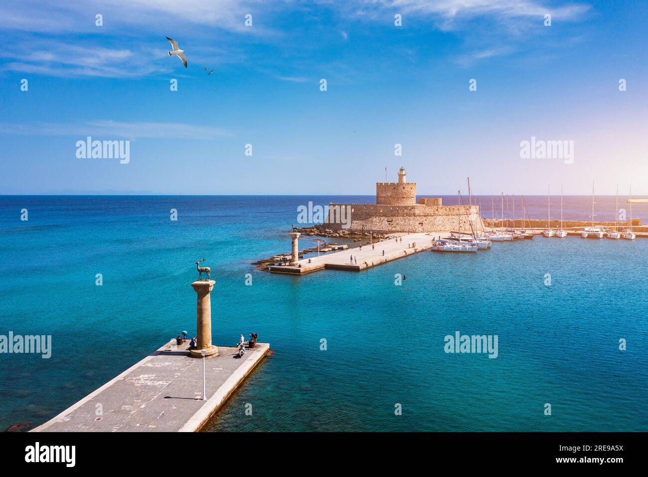 Mandraki port with deers statue, where The Colossus was standing and ...