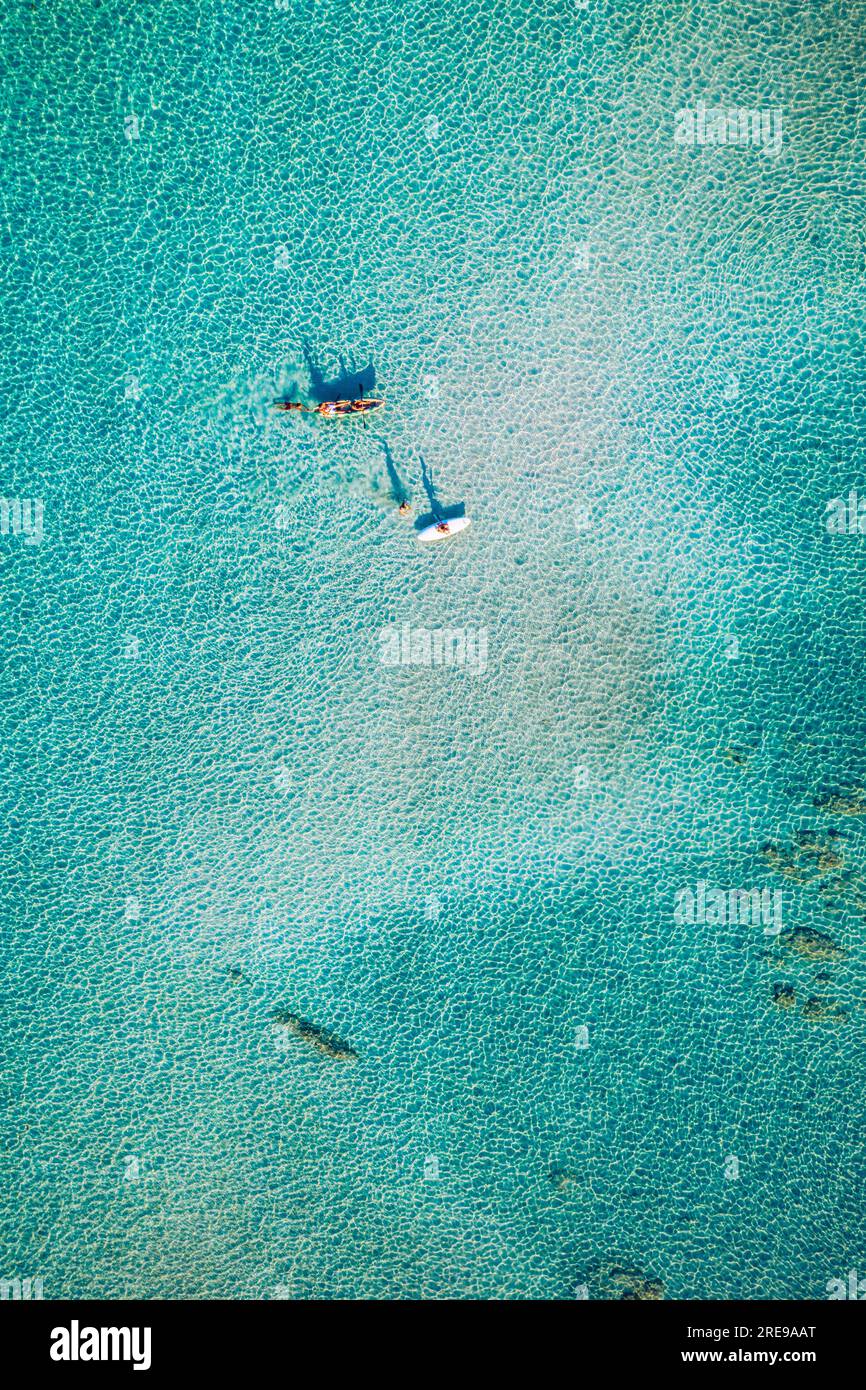 Kayaking in the sea with clear turquoise water. Kayaking, leisure ...