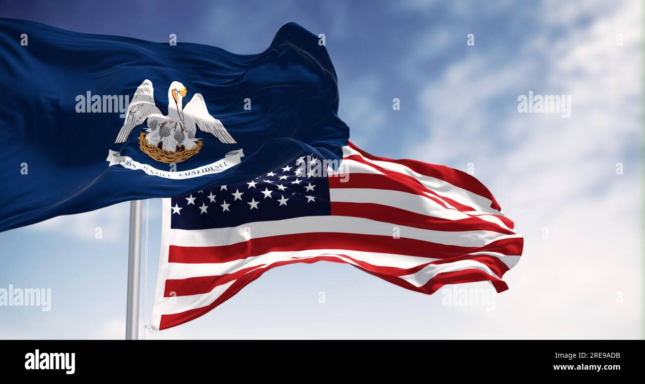 Louisiana state flag waving with the national flag of the United States ...