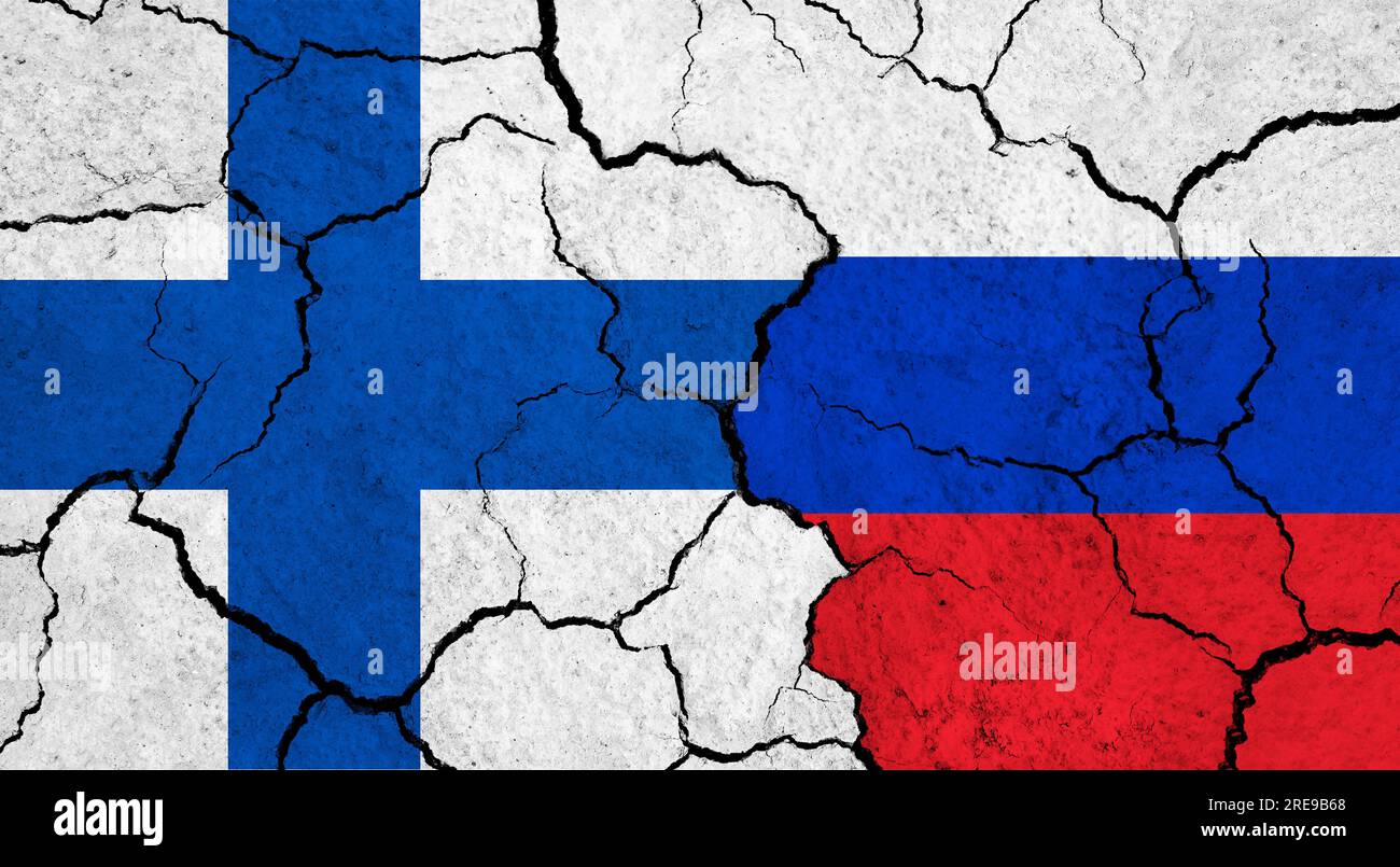 Flags of Finland and Russia on cracked surface - politics, relationship ...