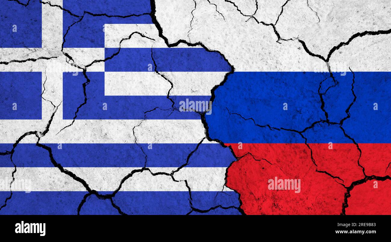 Flags of Greece and Russia on cracked surface - politics, relationship ...