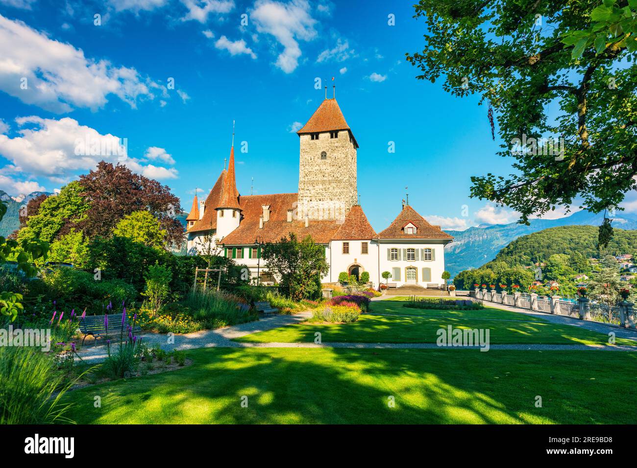 View of Spiez Church and Castle on the shore of Lake Thun in the Swiss ...