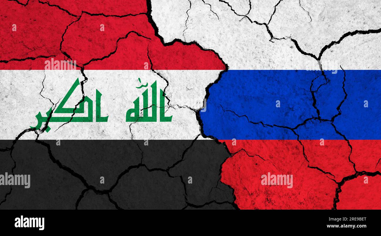 Flags of Iraq and Russia on cracked surface - politics, relationship ...