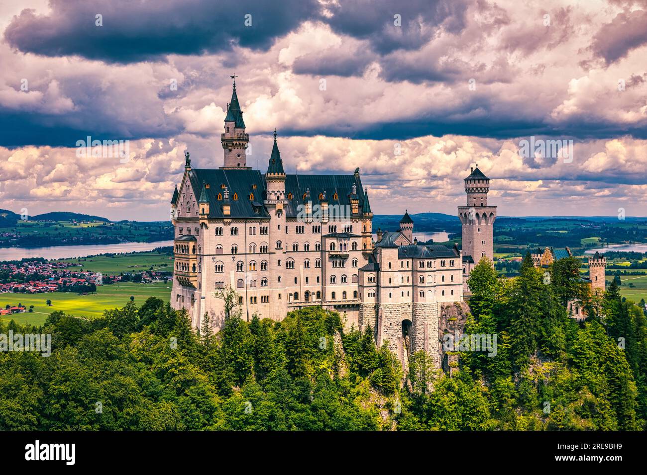 Famous Neuschwanstein Castle with scenic mountain landscape near Fussen ...