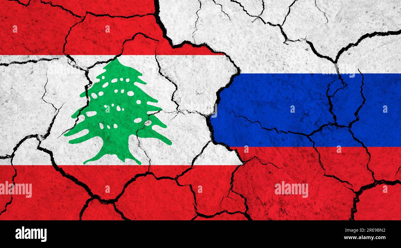 Flags of Lebanon and Russia on cracked surface - politics, relationship ...