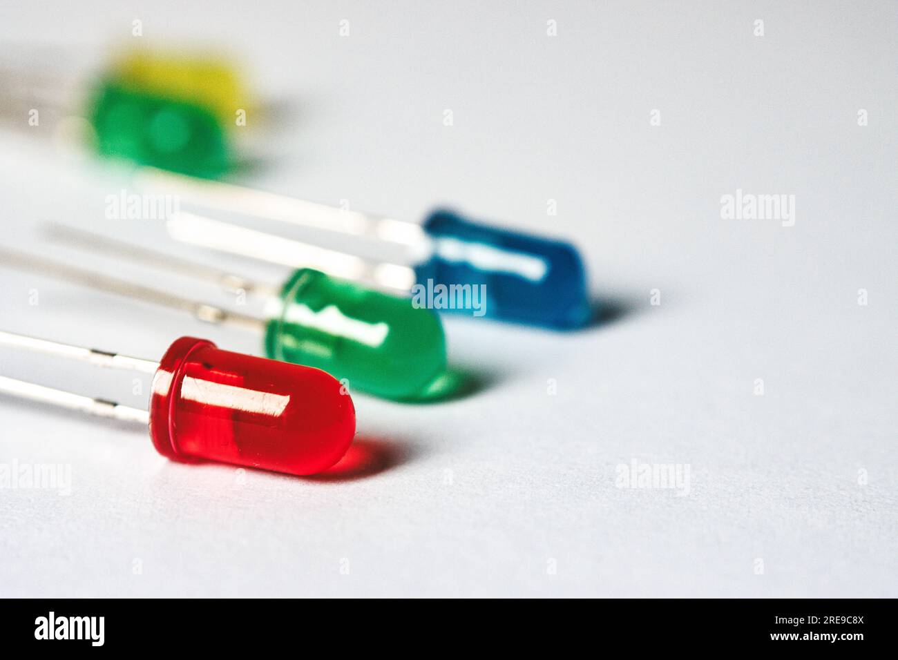 A row of Through Hole led diodes, red green and blue, electronic ...
