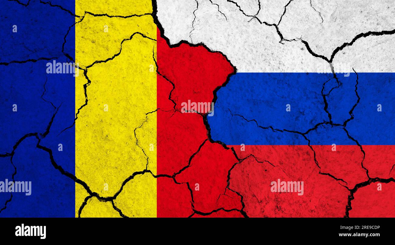 Flags of Romania and Russia on cracked surface - politics, relationship ...