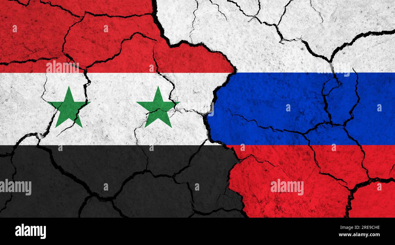 Flags of Syria and Russia on cracked surface - politics, relationship ...