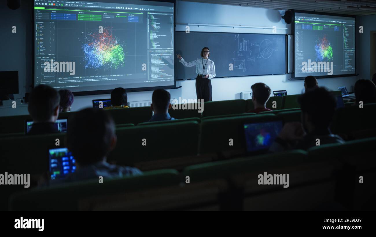 Young Female Teacher Giving a Data Science Lecture to Diverse ...