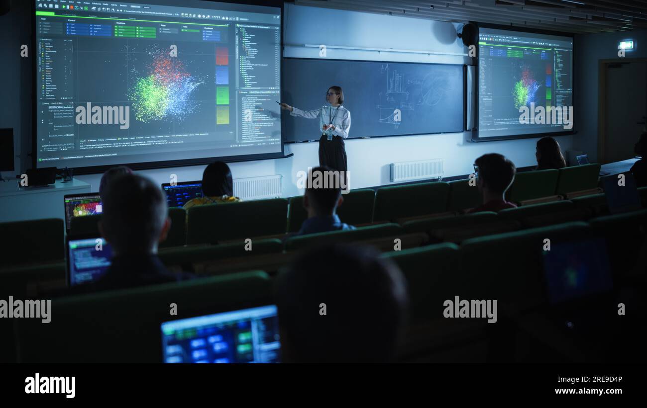 Young Female Teacher Giving a Data Science Lecture to Diverse ...