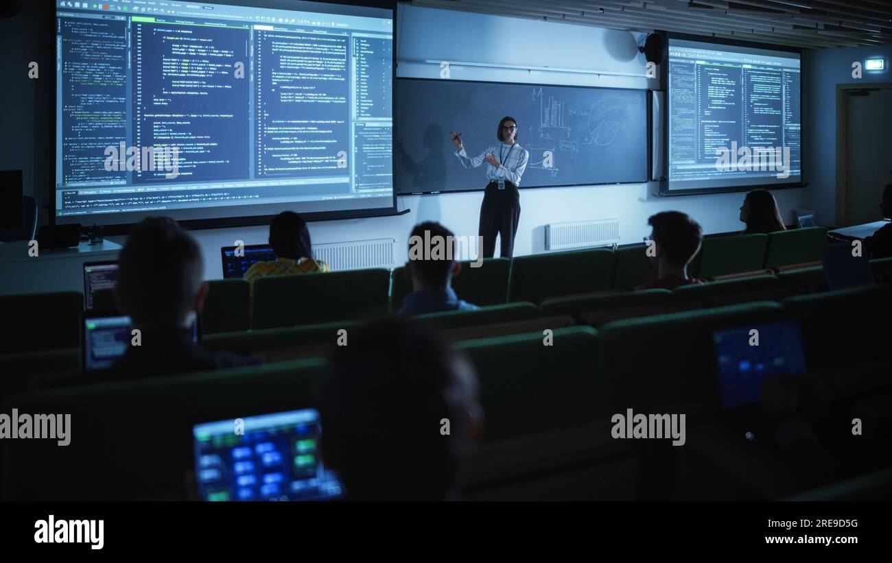 Young Female Teacher Giving a Data Science Lecture to Diverse ...