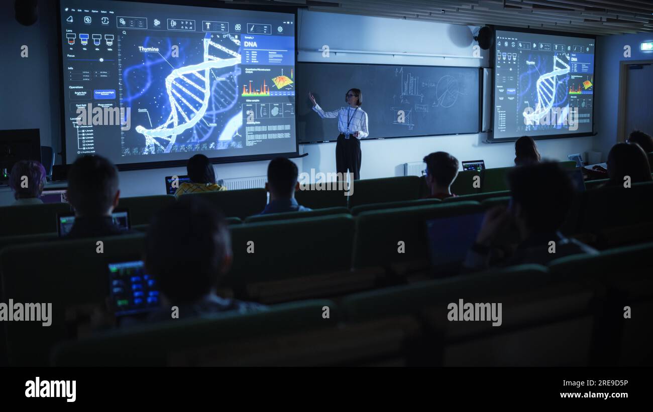 Young Female Teacher Giving a Data Science Lecture to Diverse ... Young Female Teacher Giving a Data Science Lecture to Diverse ...
