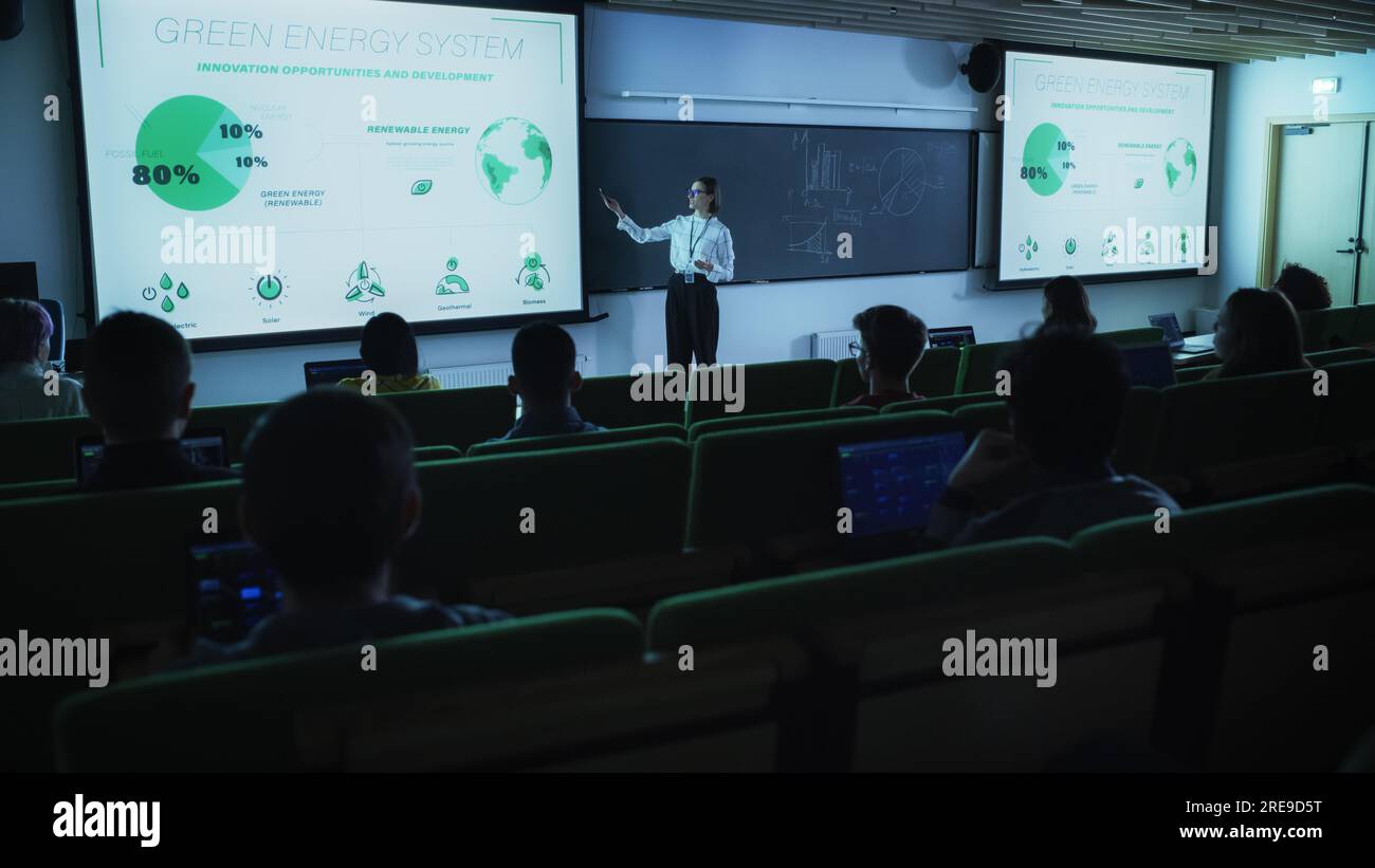 Young Female Teacher Giving a Data Science Lecture to Diverse ...