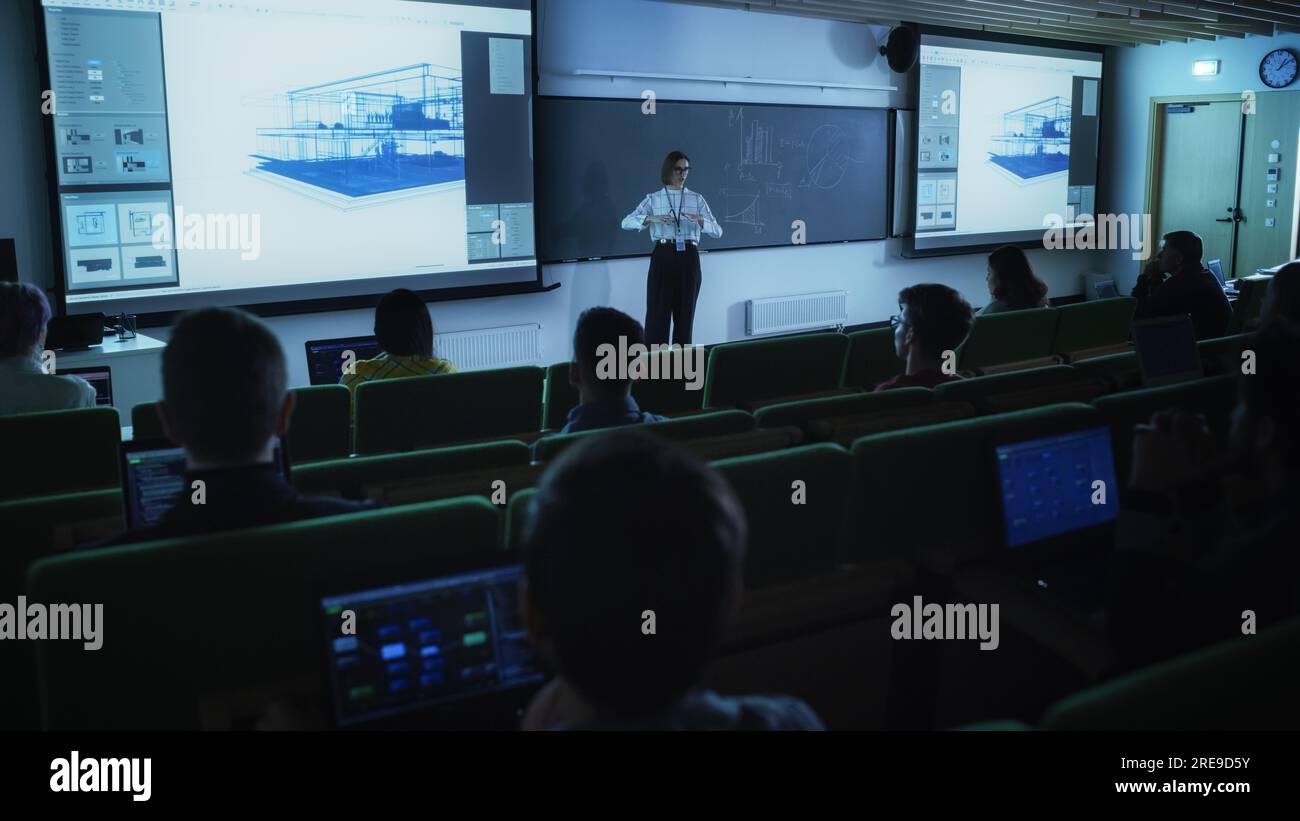 Young Female Teacher Giving a Data Science Lecture to Diverse ...