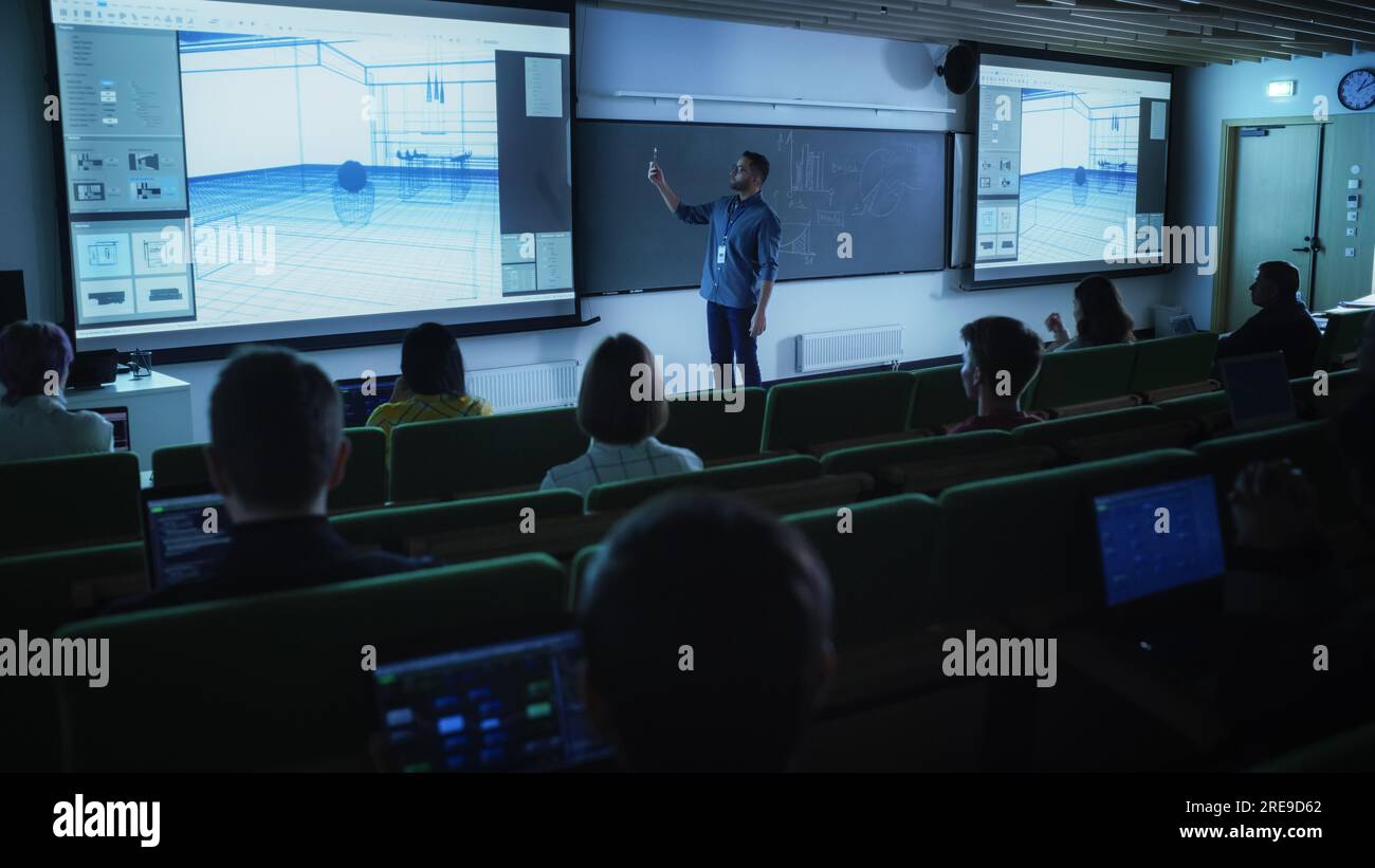 Young Male Teacher Giving a Data Science Lecture to a Diverse ...