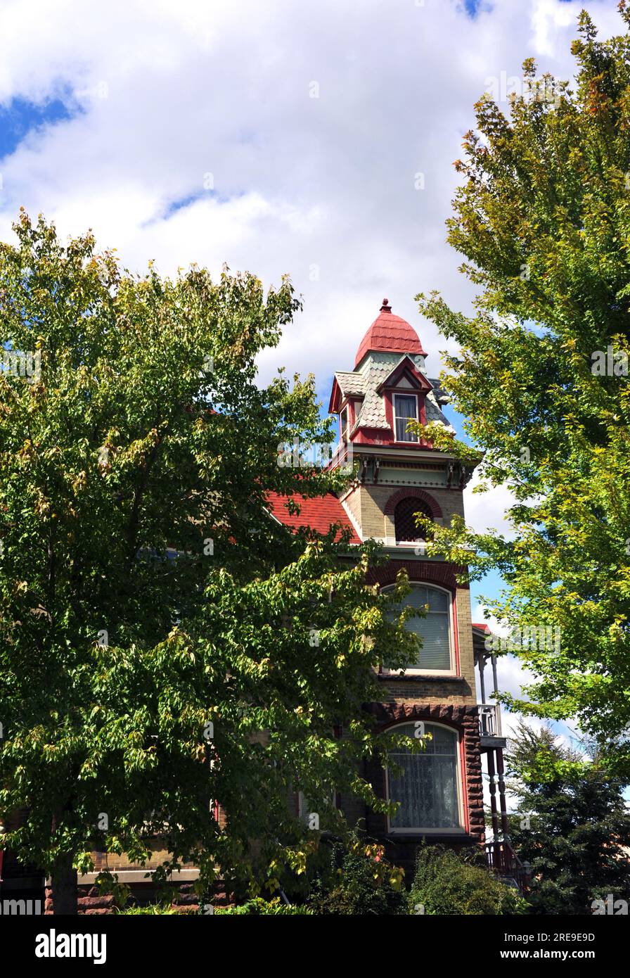 Elegant and stately, this Queen Ann Victorian home is brick and stone. Square tower is red wood ...