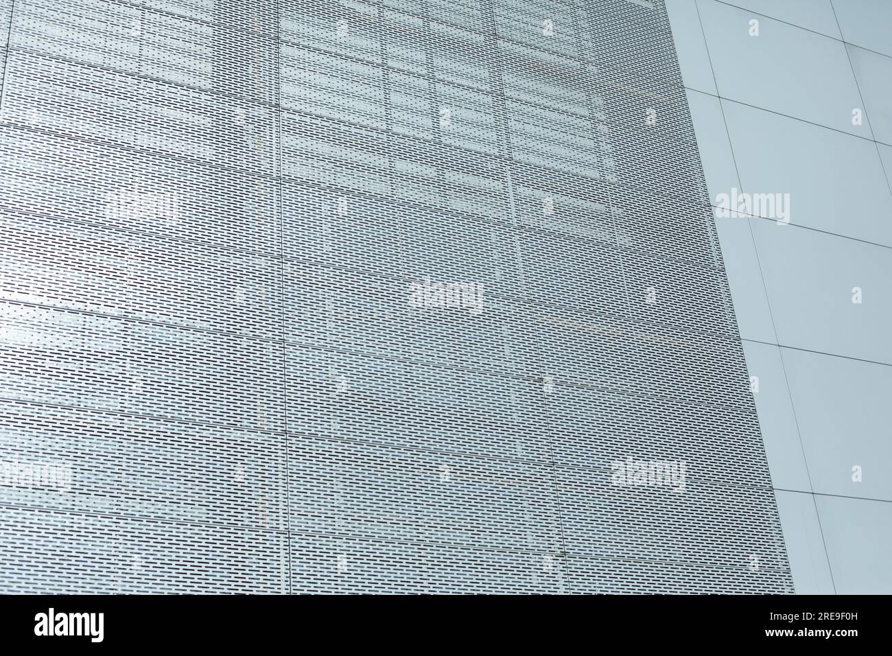 Steel wall of building. Grille on wall. Office building. Texture ...